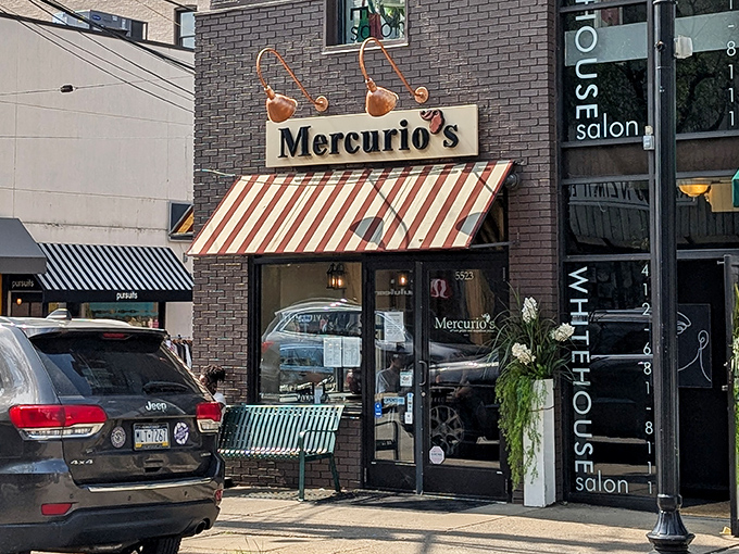 The charming storefront of Mercurio's beckons pizza pilgrims with its distinctive red and white awning&mdash;like a wink from Italy on a Pittsburgh street corner.
