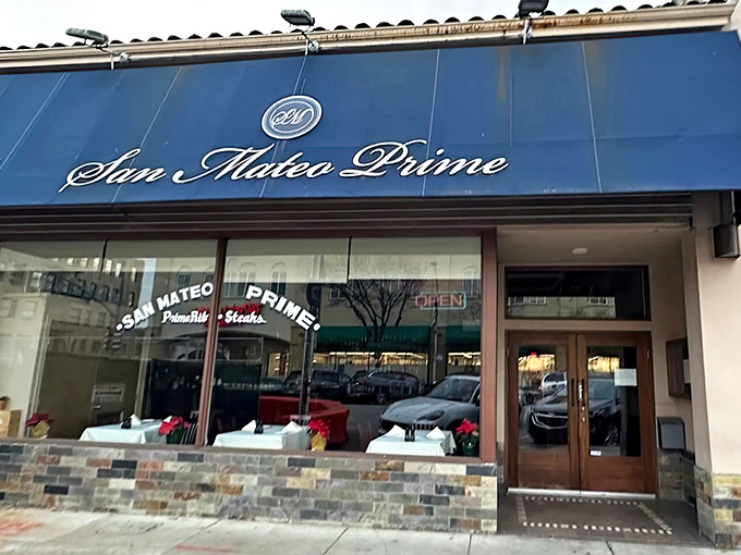 A street-level view that doesn't scream "culinary destination" yet locals know better. The best steakhouses often hide in plain sight.