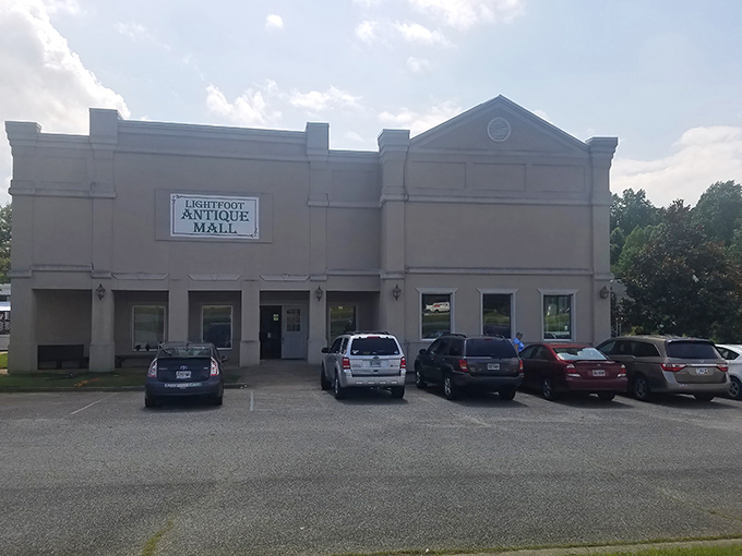 The unassuming exterior of Lightfoot Antique Mall stands like a treasure chest waiting to be unlocked. Who knew paradise could look so beige?