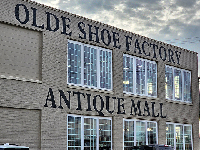 The imposing brick facade of the Olde Shoe Factory Antique Mall stands as a time capsule in Lancaster, beckoning treasure hunters with promises of nostalgia and discovery.