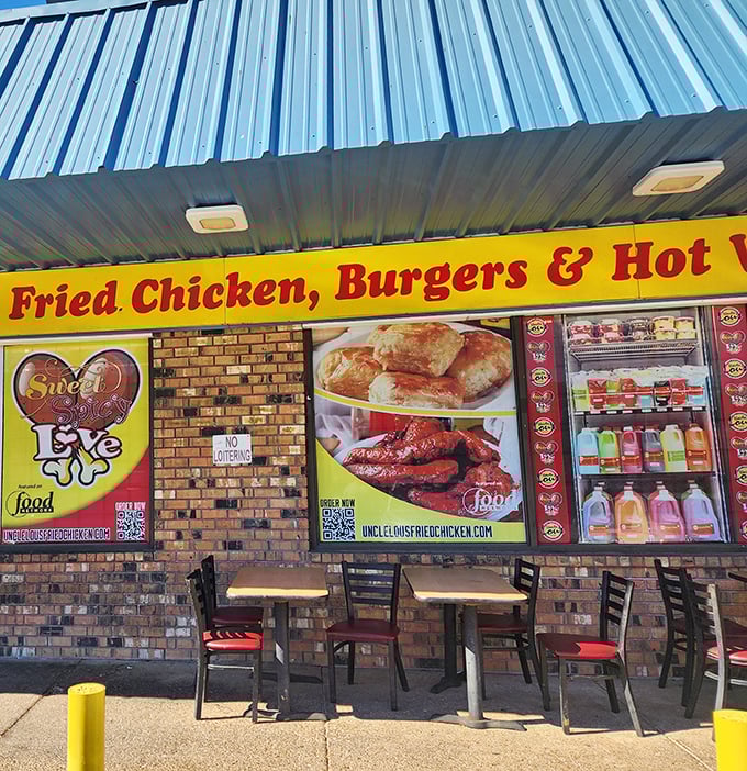 The blue metal roof and brick facade might not scream "culinary destination," but that Sweet Spicy Love logo promises flavor treasures within.