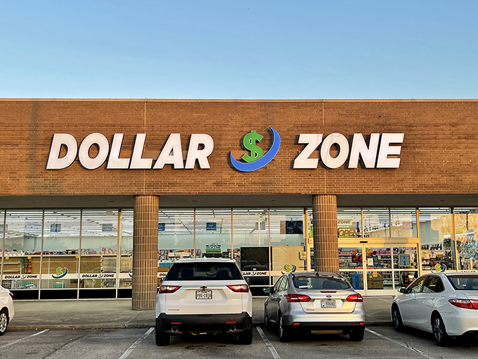 The iconic Dollar Zone sign beckons bargain hunters like a retail lighthouse guiding ships full of empty shopping carts to shore.