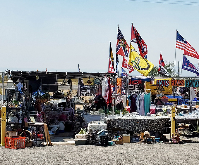 The desert sun beats down on Neely's Korner, where treasures wait beneath that iconic yellow sign—Arizona's answer to Ali Baba's cave.