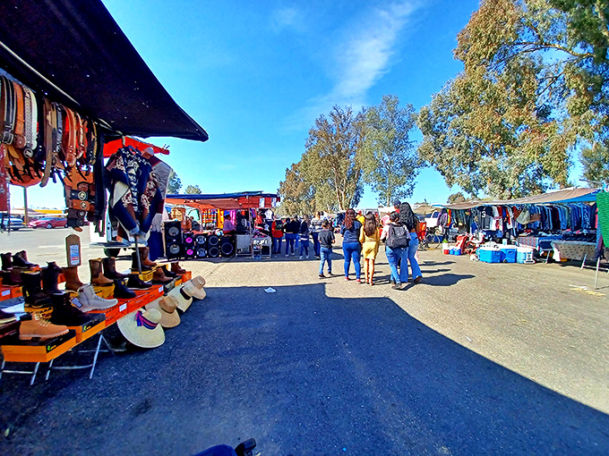 Wide-open aisles and blue California skies create the perfect backdrop for treasure hunting. Cowboy hats and colorful clothing beckon from every direction.