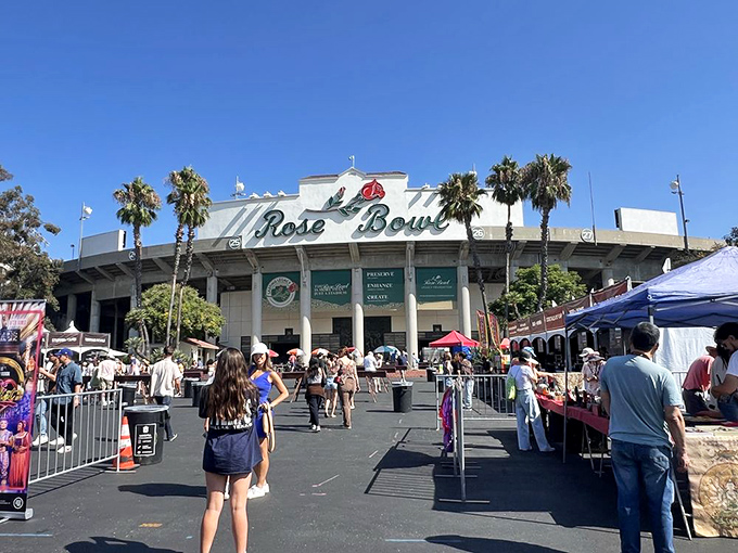 The iconic Rose Bowl entrance transforms monthly from football shrine to treasure hunter's paradise, where early birds catch the mid-century modern worm.
