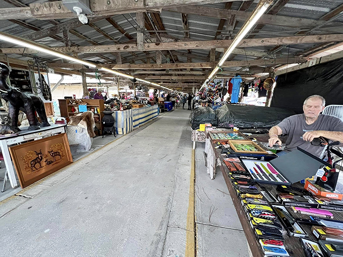 The covered pavilions at Howard's Flea Market stretch endlessly, promising treasures in every corner and under every table.