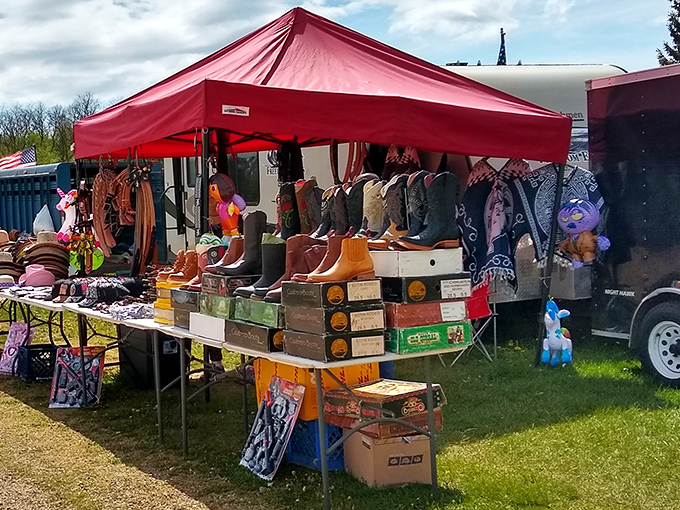 Under cheerful red canopies, vintage treasures and modern finds create a delightful chaos only flea market lovers understand.