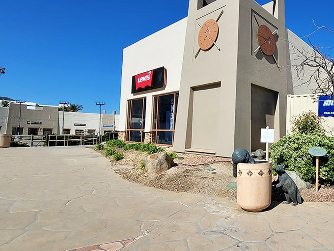 The distinctive Southwestern architecture of Viejas Outlet Center welcomes shoppers with its earthy tones and iconic clock tower. Levi's beckons with promises of denim dreams.