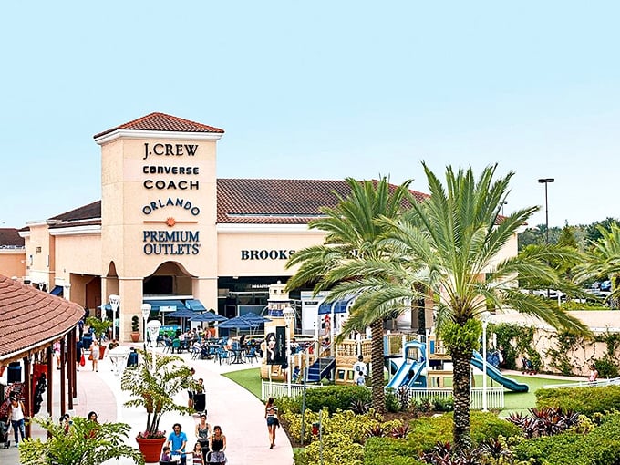 Mediterranean-inspired architecture meets retail therapy paradise. Palm trees sway as shoppers hunt for treasures under Florida's blue skies at Orlando Vineland Premium Outlets.