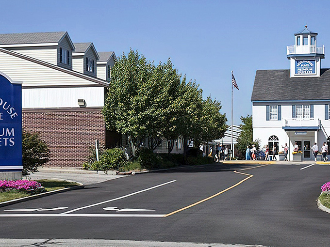 The iconic lighthouse structure welcomes bargain hunters like a beacon of retail hope. Your wallet might actually thank you for this shopping trip.