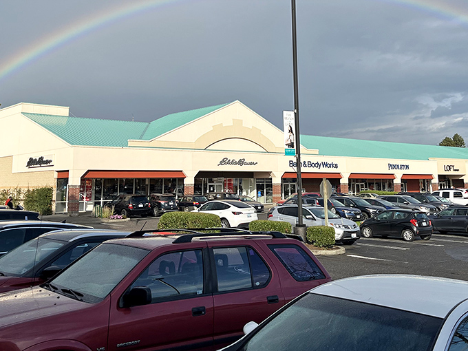 A rainbow arches over Columbia Gorge Outlets, nature's way of saying "Yes, these deals are actually real."