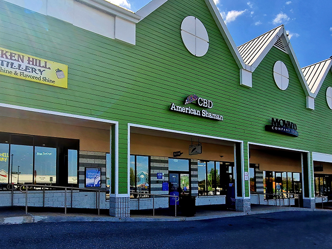 The distinctive green-gabled buildings of Tanger Outlets Lancaster stand like beacons of bargain hope, welcoming shoppers to a retail paradise nestled in Amish country.