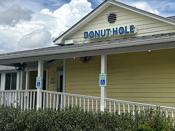 The unassuming yellow exterior of Donut Hole belies the breakfast paradise within. Like finding a treasure chest disguised as a mailbox.