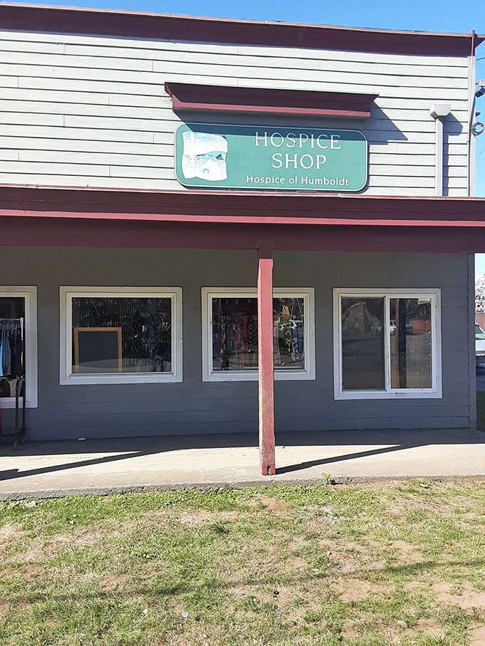 The unassuming exterior belies the wonderland within - like finding a portal to bargain heaven behind this modest green sign.