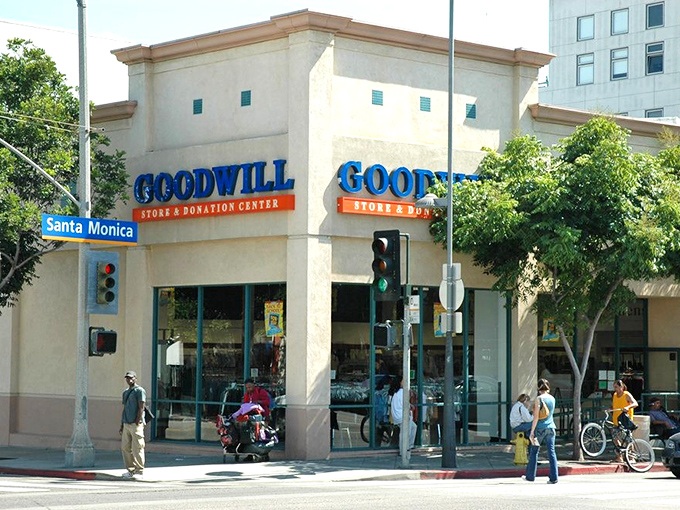 The Santa Monica Goodwill stands like a treasure chest at the corner of 4th and Santa Monica Boulevard, beckoning bargain hunters and sustainable shoppers alike.