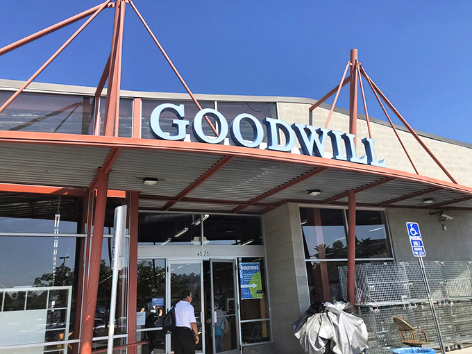 The gateway to treasure hunting paradise! Goodwill's welcoming facade promises adventures in sustainable shopping where one person's castoffs become another's conversation pieces.