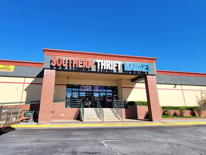 The red, white, and blue sign beckons like a patriotic promise of bargains within. This unassuming storefront holds treasures waiting to be discovered.