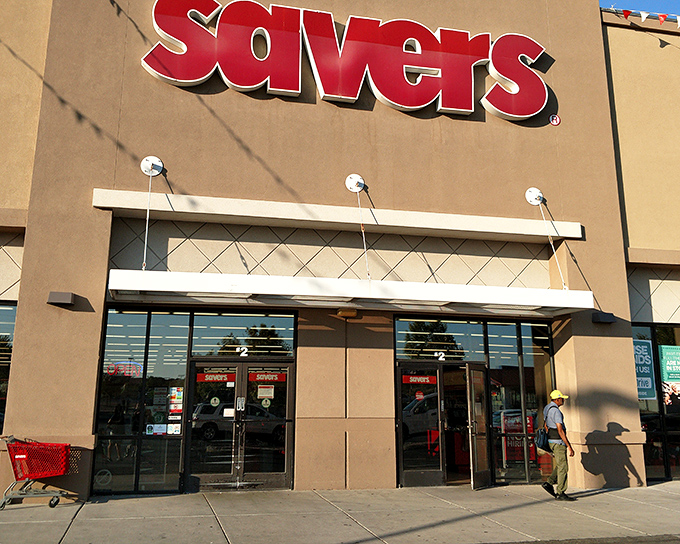 The bright red Savers sign beckons like a lighthouse for the budget-conscious shopper. This unassuming storefront houses treasures waiting to be discovered.