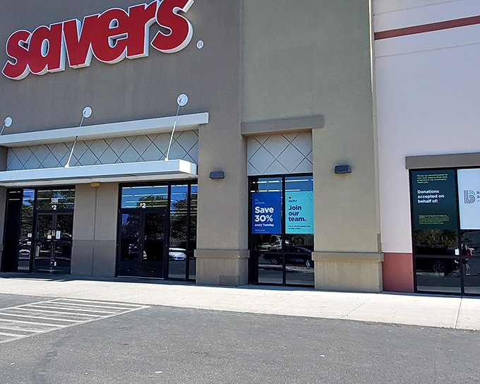 The bright red Savers sign beckons like a lighthouse for the budget-conscious shopper. This unassuming storefront houses treasures waiting to be discovered.