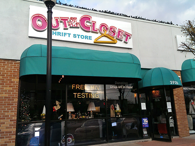 The iconic pink and teal signage of Out of the Closet beckons like a beacon of bargain hope in Dallas's retail landscape.