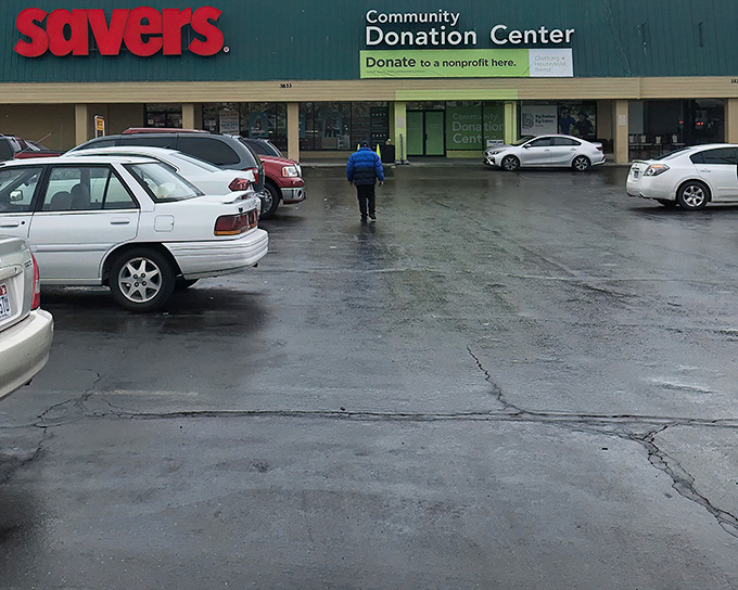 The Savers storefront welcomes bargain hunters with its bright red sign and dedicated donation center, where one person's castoffs become another's treasures.