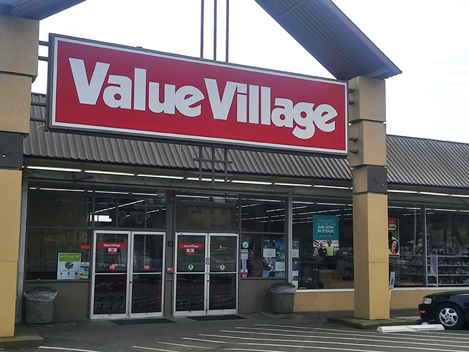 The iconic red Value Village sign beckons like a lighthouse for bargain hunters navigating the sea of retail options in Burien.