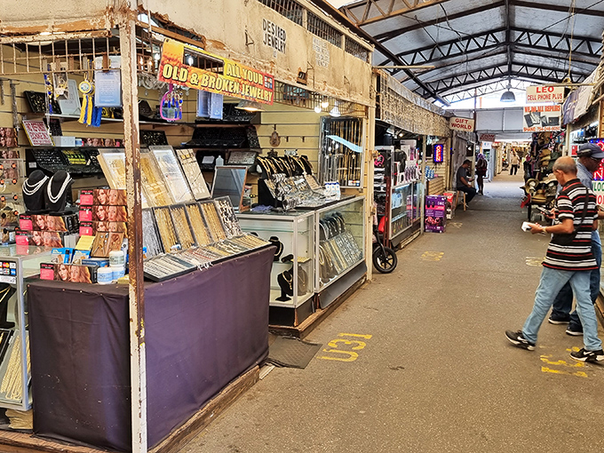 Treasure hunters navigate the indoor market's narrow corridors, where yesterday's curiosities become tomorrow's conversation pieces.