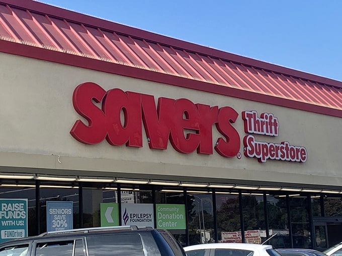 Another angle of the Savers storefront, where the bold red lettering announces itself as more than just a thrift store—it's a "Superstore" of possibilities.