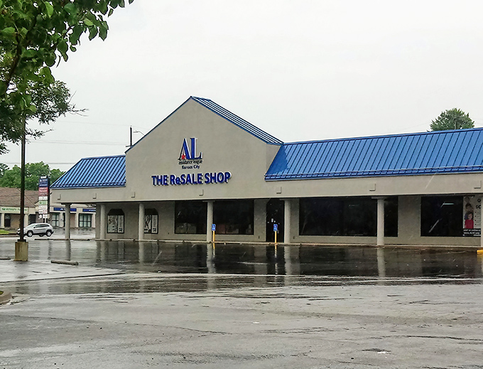 The blue-roofed treasure chest of THE ReSALE SHOP stands ready to welcome bargain hunters, even on rainy days when indoor adventures call your name.