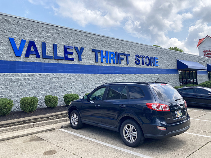The blue and white facade of Valley Thrift Store stands like a beacon of bargain possibilities, promising treasures waiting to be discovered inside.