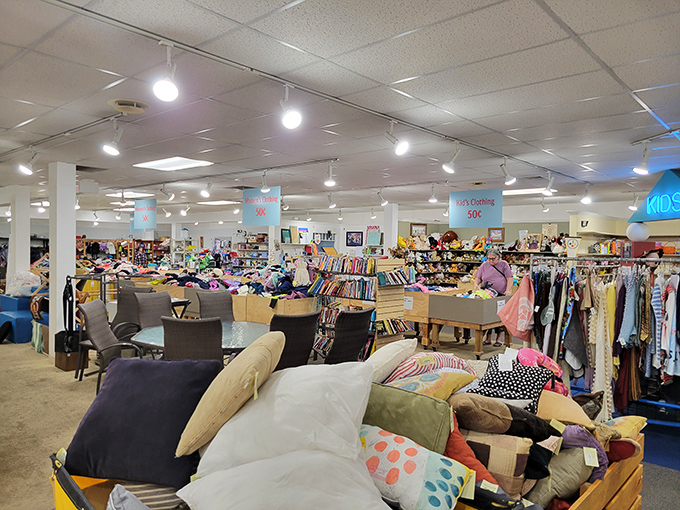 Treasure hunting paradise! The expansive interior of Re-Uzit Shop offers everything from furniture to clothing, with enough pillows to build the world's coziest fort.