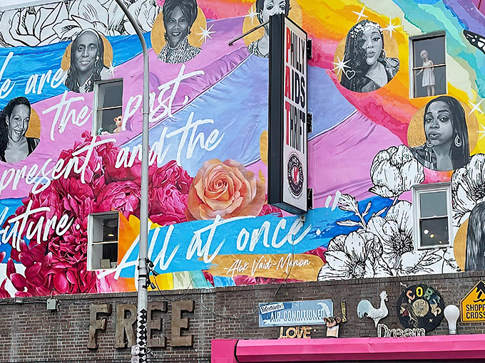 The exterior mural explodes with color and inspiration, transforming a brick building into a vibrant beacon of creativity in Queen Village.