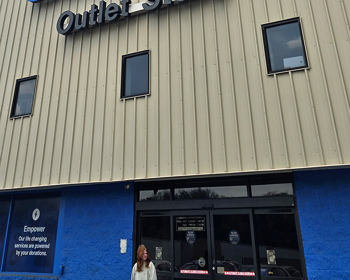 The unassuming exterior of Goodwill's Outlet Store in North Versailles—where treasure hunting begins and wallets breathe sighs of relief.