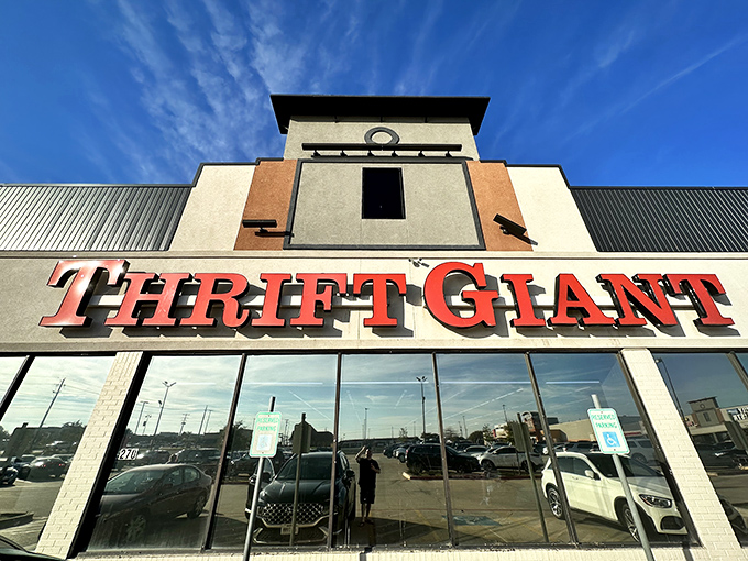 The iconic red Thrift Giant sign stands out against the Texas sky, beckoning bargain hunters like a retail lighthouse guiding ships to treasure.