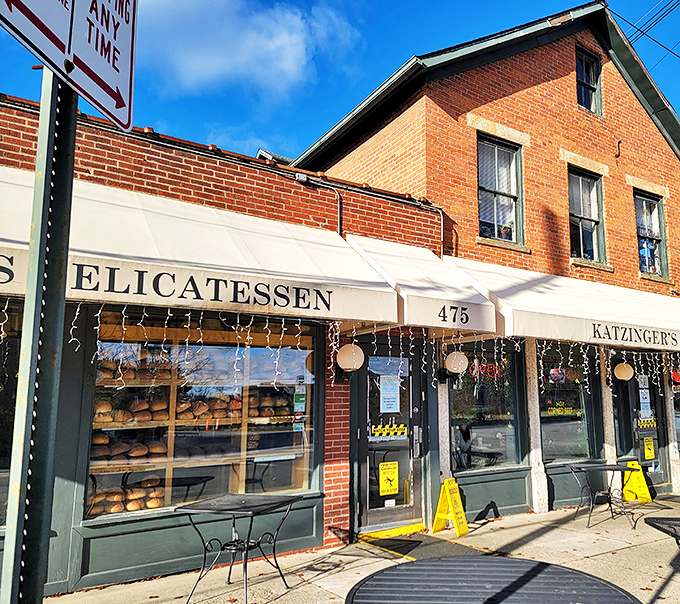That iconic white awning beckons like a culinary lighthouse, guiding hungry souls to a harbor of corned beef and fresh-baked rye.