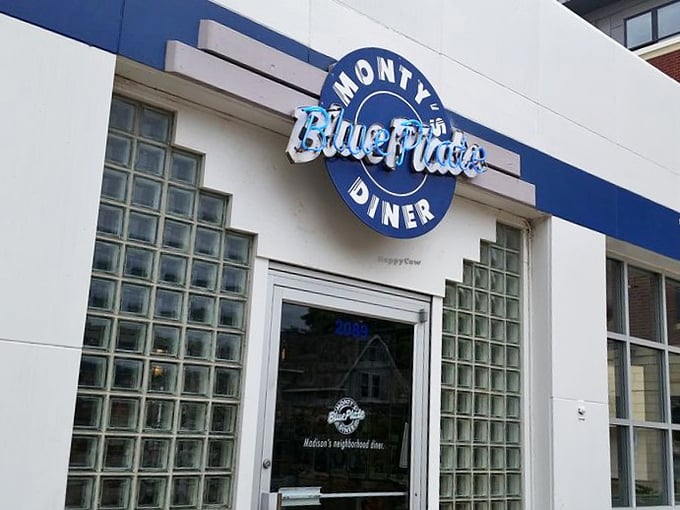 The iconic blue and white facade of Monty's Blue Plate Diner stands as a beacon of comfort food in Madison's Atwood neighborhood. Classic Americana at its finest.