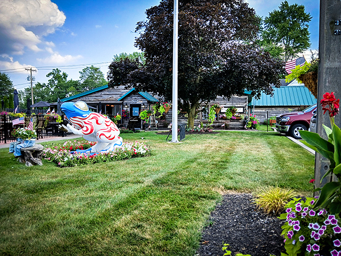 The rustic log cabin exterior of The Whitehouse Inn feels like discovering a presidential retreat where the only executive orders are for prime rib.