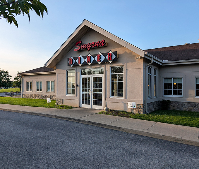 The classic red script against beige siding announces your arrival at breakfast paradise. Smyrna Diner stands ready to welcome hungry travelers and locals alike.