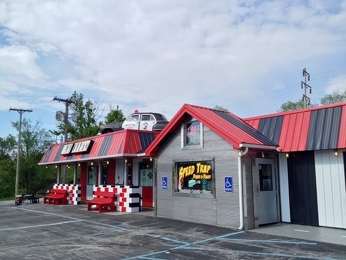 Where nostalgia meets appetite! The Speedtrap Diner's iconic police car perched on the roof serves as both landmark and loving warning to hungry travelers passing through Woodville.