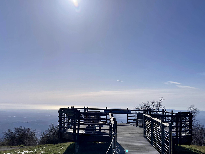 The observation deck stands sentinel at the mountain's edge, offering panoramic views that make your smartphone camera feel woefully inadequate.
