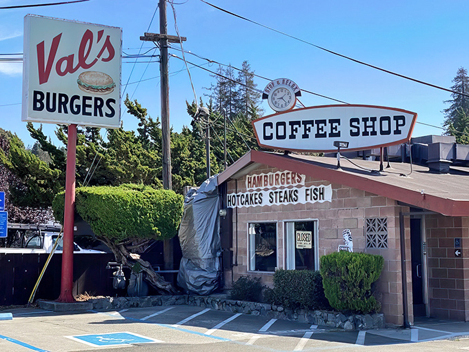From another angle, Val's vintage charm shines even brighter. The "HAMBURGERS HOTCAKES STEAKS FISH" signage tells you everything you need to know about life's simple pleasures.