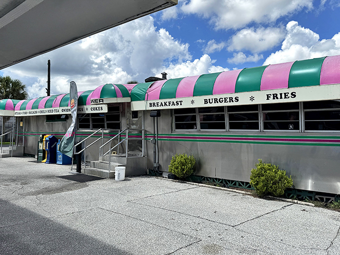 The pink and green striped awning of Angel's Dining Car isn't just eye-catching&mdash;it's a beacon of hope for hungry travelers who know what culinary treasures await inside.