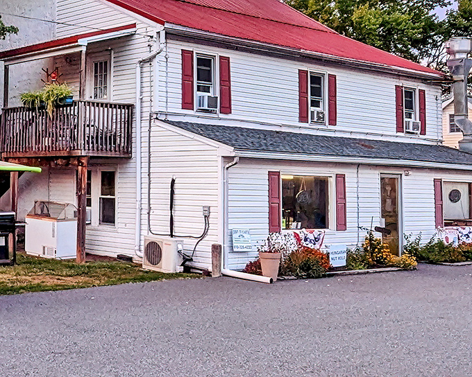 Red shutters frame this unassuming culinary treasure, where Pennsylvania comfort food traditions are lovingly preserved.