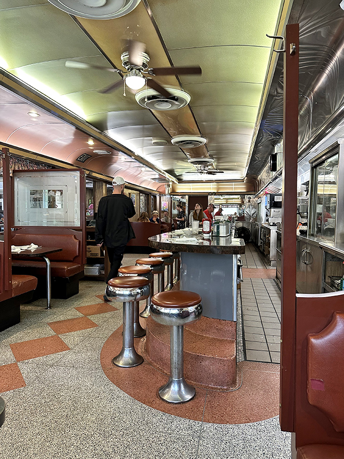 Classic diner charm at its finest&mdash;wood paneling, tile floors, and red vinyl booths that have witnessed countless coffee refills and life-changing pie decisions.