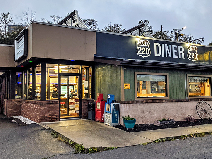 The twilight glow makes Route 220 Diner look like Edward Hopper's "Nighthawks" reimagined in Bedford&mdash;a beacon for hungry travelers on Pennsylvania's highways.