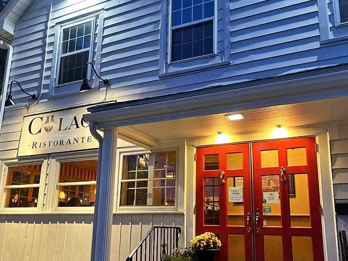 The charming white exterior of Colao's with its vibrant red door isn't just inviting&mdash;it's practically Italian for "get in here and eat something wonderful."