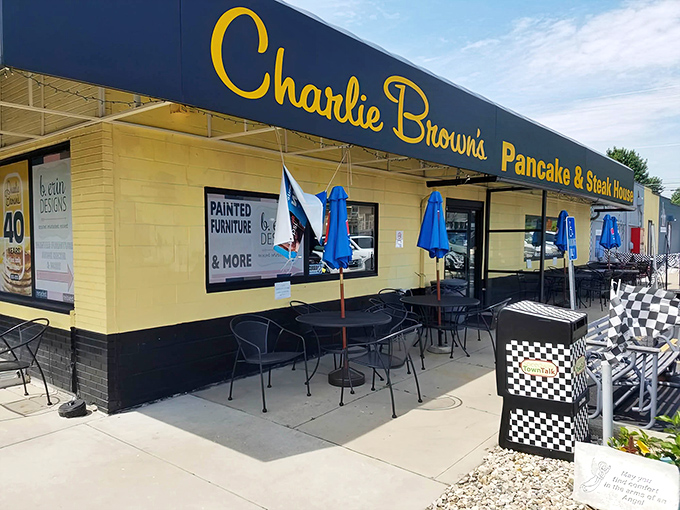 The cheerful yellow exterior with bold blue signage isn't trying to win architectural awards&mdash;it's too busy perfecting breakfast classics that keep locals coming back.