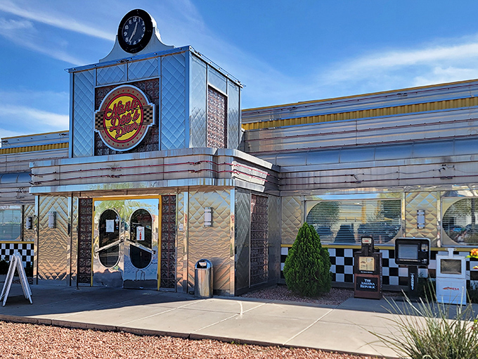 Nana Dee's gleaming metallic exterior shines like a beacon of breakfast hope in Mesa, where the classic diner architecture promises timeless comfort inside.