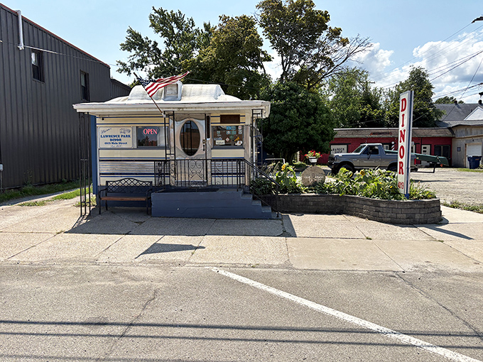 The little diner that could! Park Dinor's charming exterior in Lawrence Park stands as a time capsule of Americana, complete with vintage signage and welcoming garden.