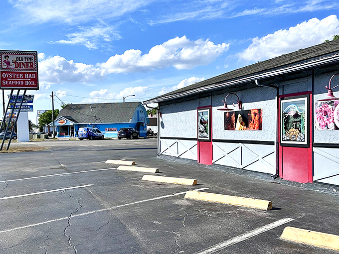 The Old Time Diner's exterior beckons like a lighthouse for hungry souls, promising comfort food salvation in Leesburg's sea of chain restaurants.